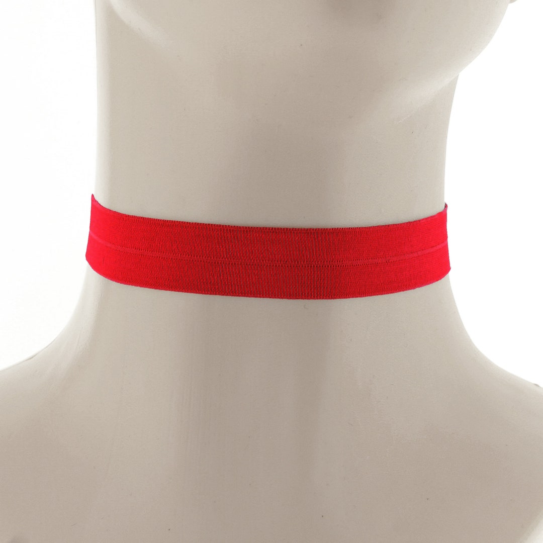 Red Choker Necklace Features a Thin Ribbon That Stretches and Has an ...