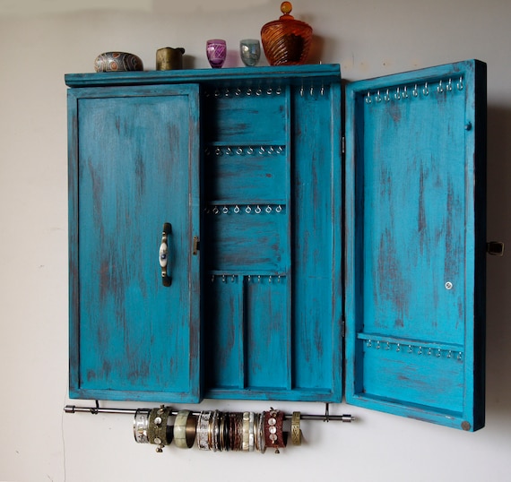 Turquoise jewelry armoire store
