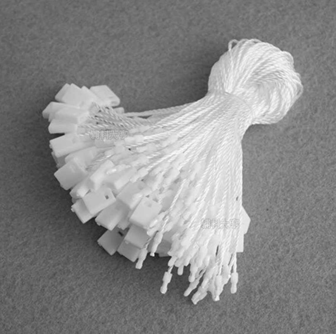 Hang Tag Strings - Label Strings - Locking Strings - Snap Lock ...