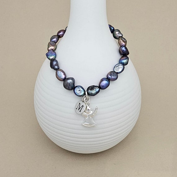Black pearl charm store