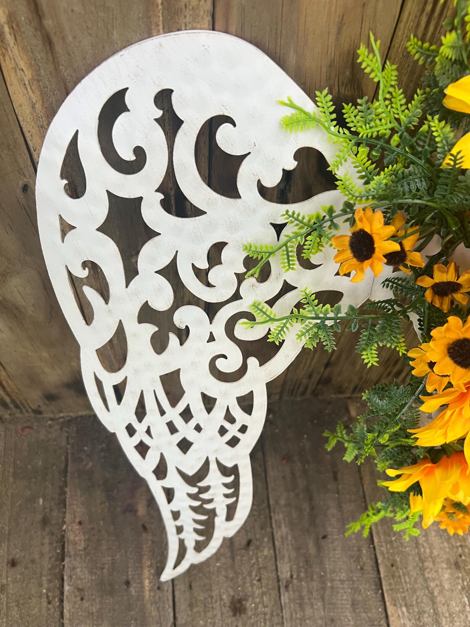 Metal Angel Wings With Side Floral Arrangement. Flowers Cover One Side ...