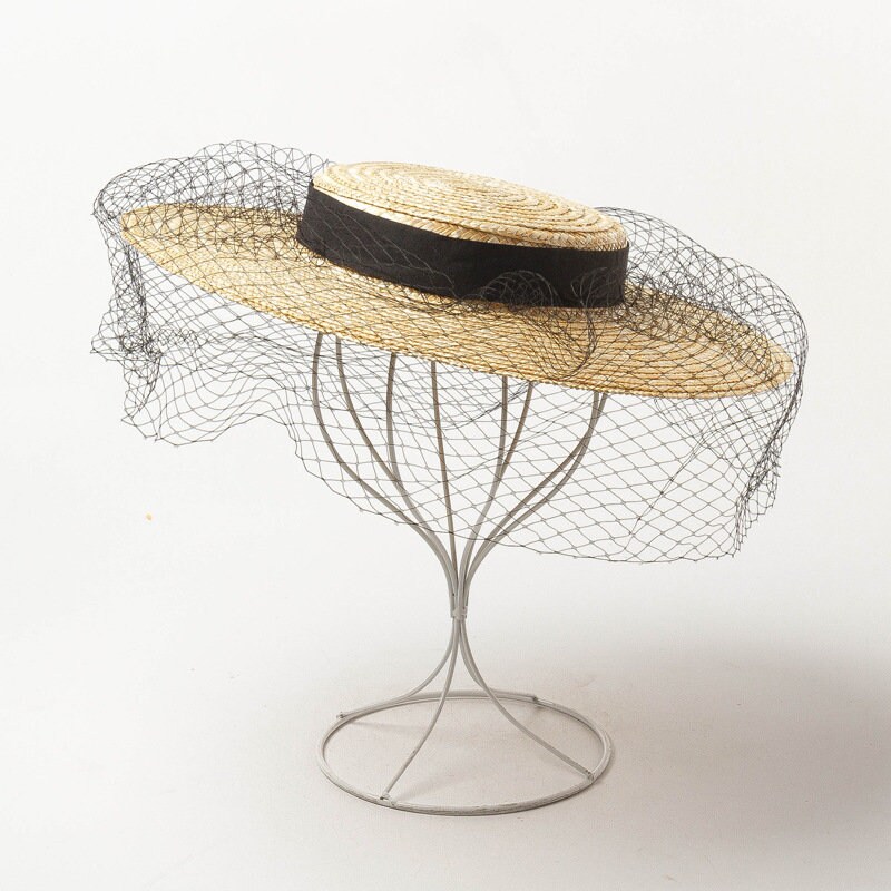 A Straw Hat With a Flat Top and Wide Eaves Decorated With | Etsy