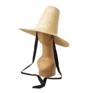 Fashion Show Modeling Straw Hat With Big Brim Straw Hat With High ...