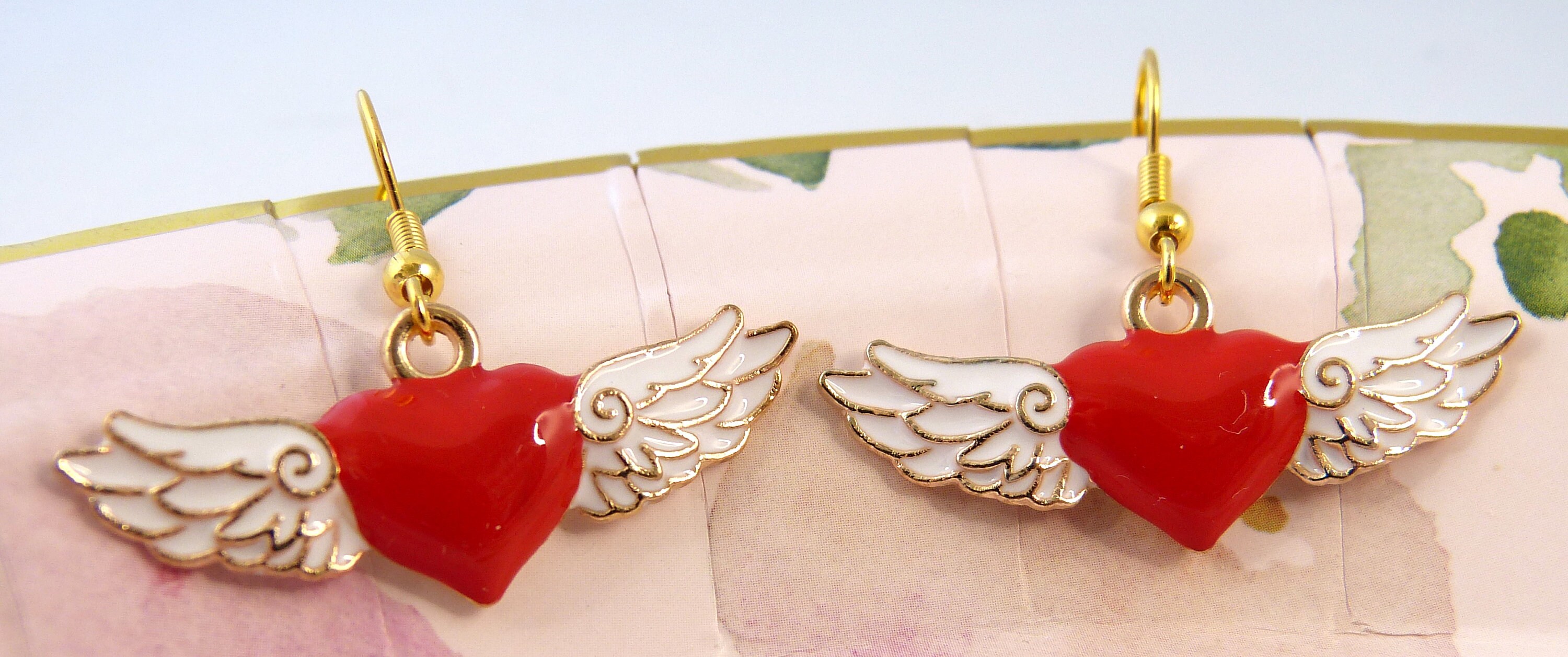 Heart with wings earrings store