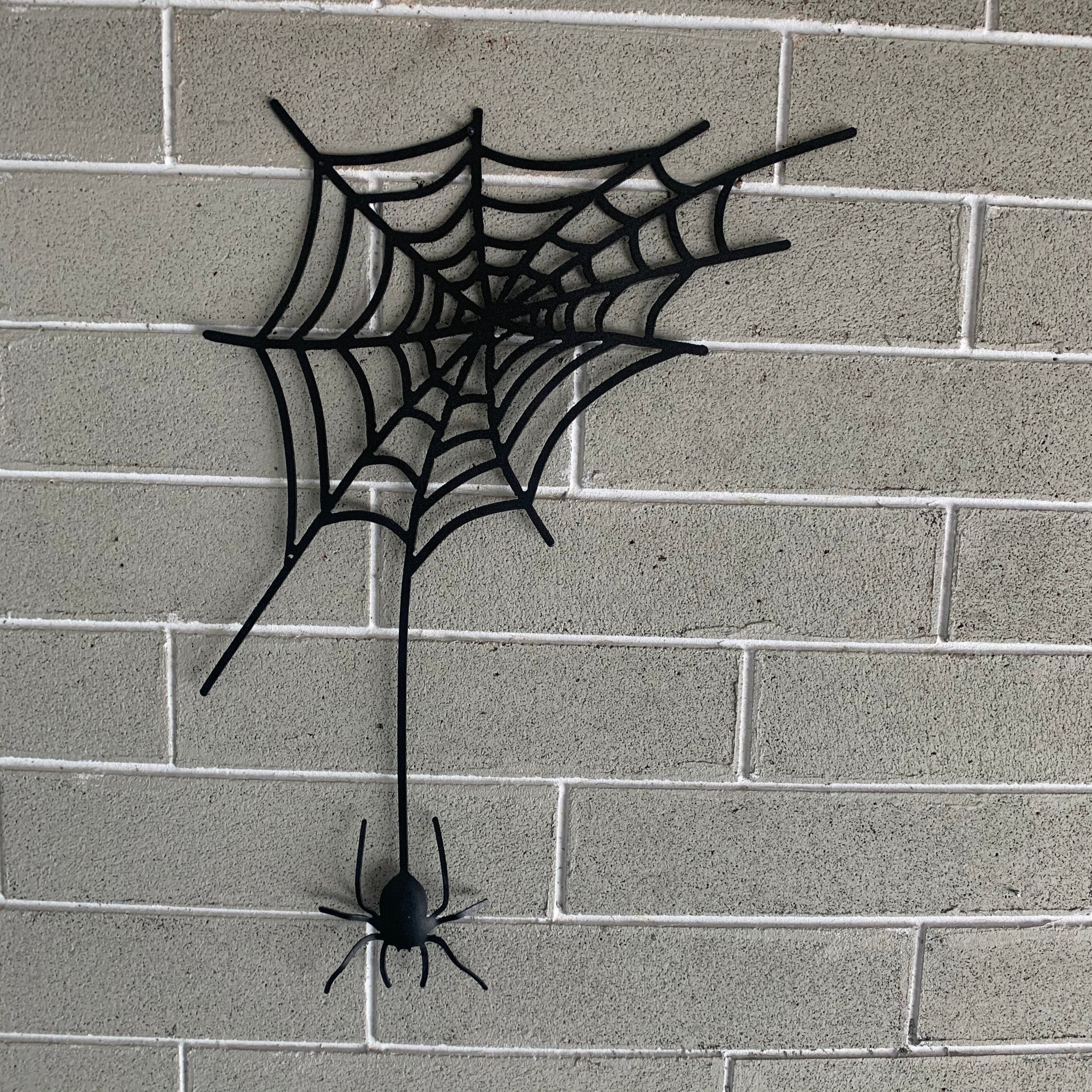 Metal wall hanging spider and web