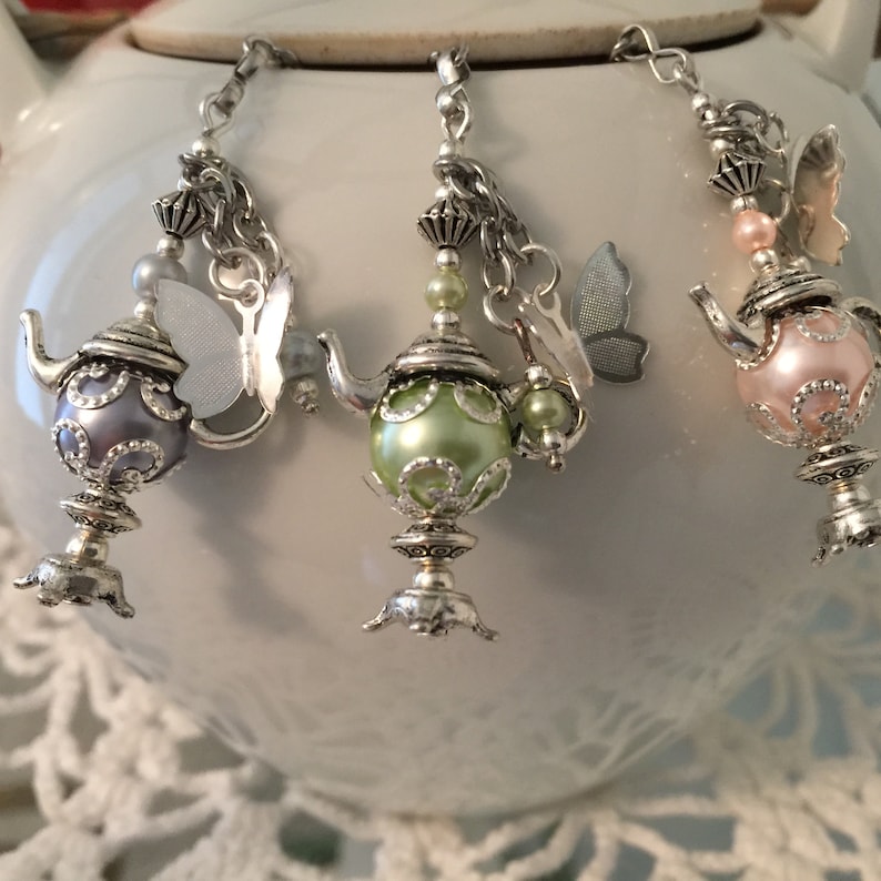 Beautiful Elegant Glass Pearl Teapot Tea Bag Clip or Mesh Infuser Tea ...