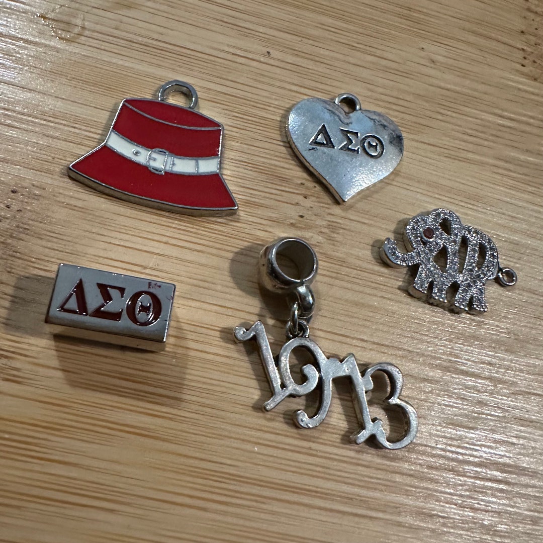 5 Delta Charms - Etsy