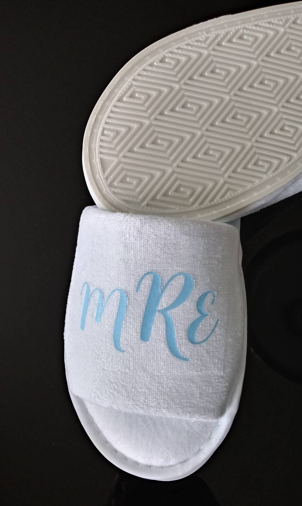 Monogram Slippers | IUCN Water