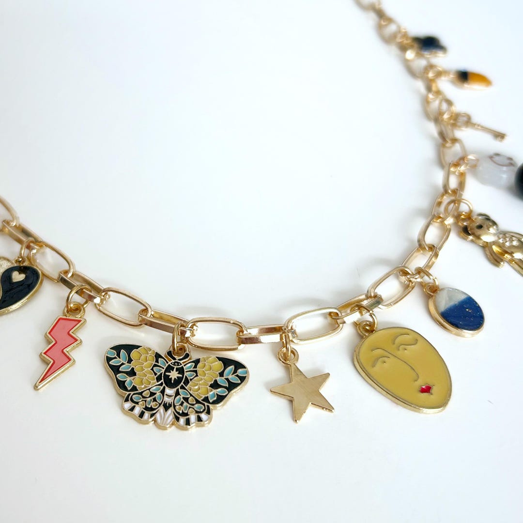 Gold Quirky Charm Necklace. Trendy, Versatile, and Playful Charm ...