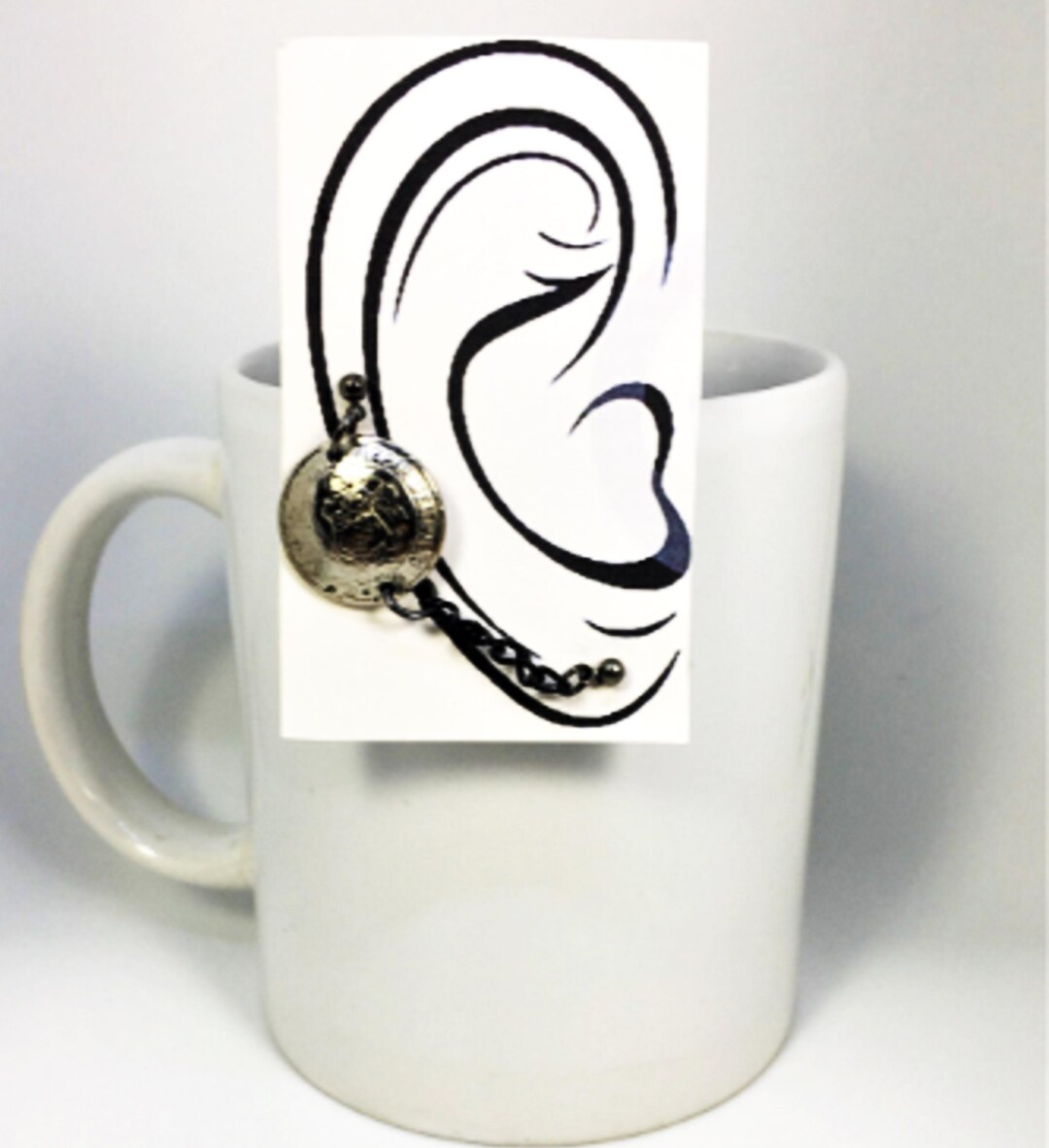 Double Piercing Earrings With a Rounded Peruvian Coin With a Black ...