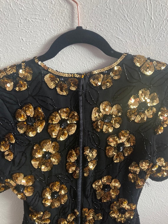 Small gold flower sequin design on black silk top - Gem