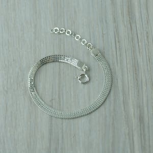 Sterling Silver Flat, Band Bracelet, This Prestigious Piece of Jewelry ...