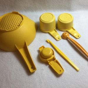 Tupperware in Yellow Colander 2 Measuring Cups Egg Separator Citrus ...