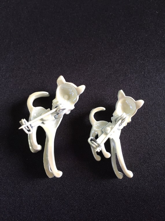 Vintage pair of pearly white enamel cats with moving … - Gem