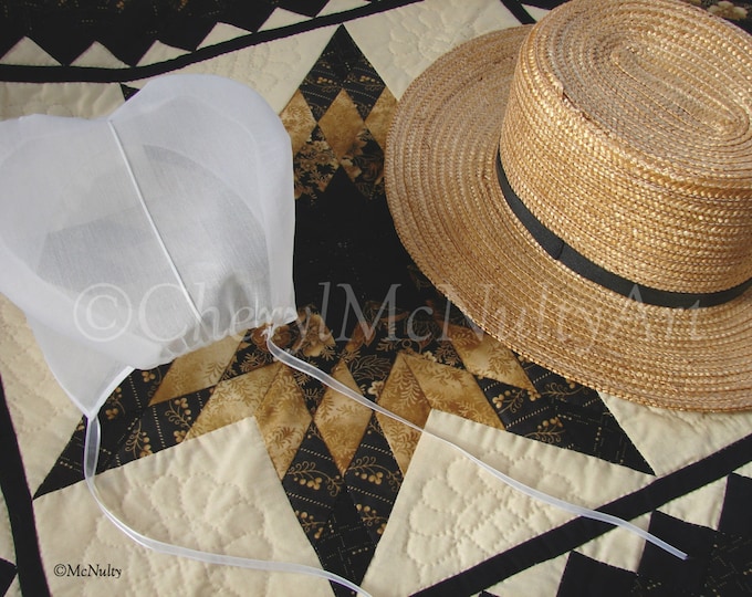 Amish Prayer Cap and Straw Hat on Amish Quilt Photographic Print Amish ...