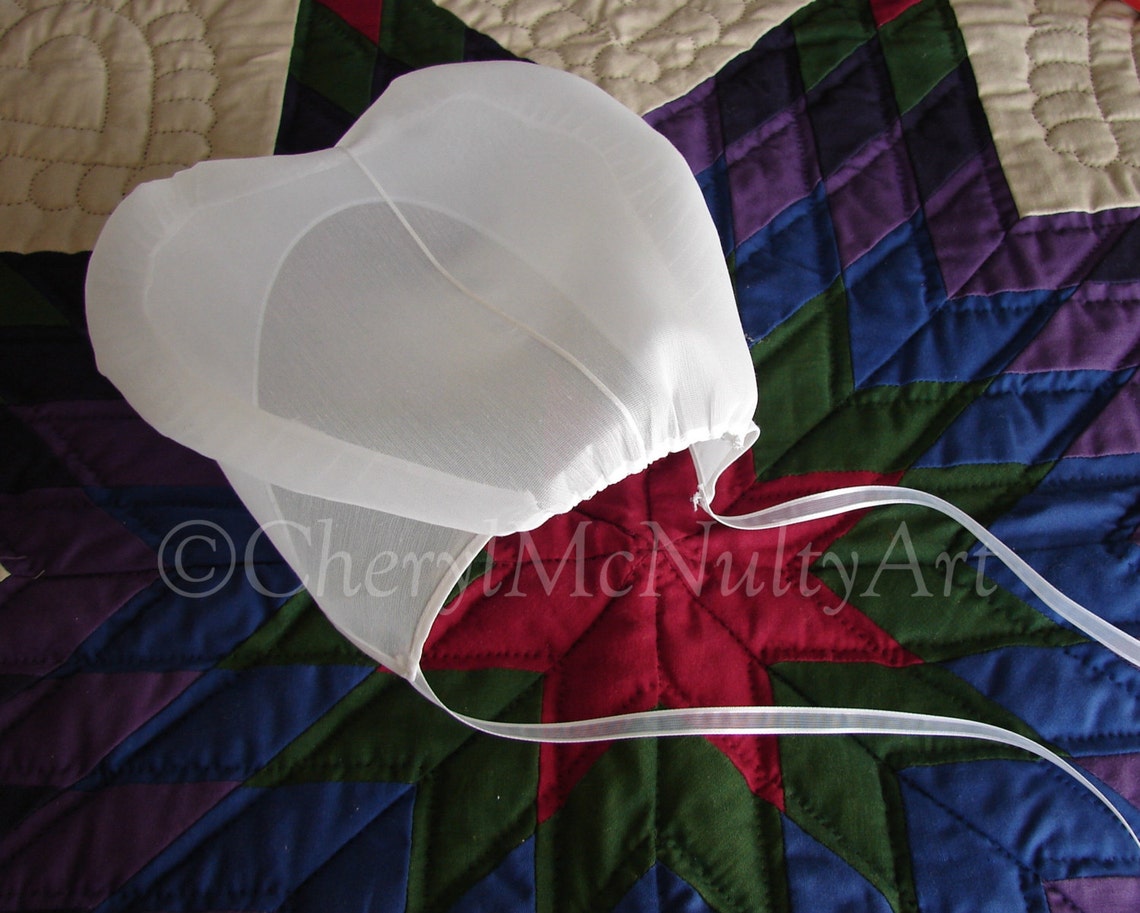 Amish Prayer Cap on Quilt Photographic Print Amish Living Clothing ...