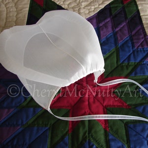 Amish Prayer Cap on Quilt Photographic Print Amish Living Clothing ...