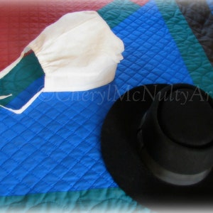 Amish Hat and Prayer Cap on Amish Quilt Photographic Print of Amish ...