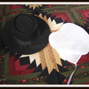 Amish Prayer Cap and Men's Felt Hat on Amish Quilt Photographic Print ...