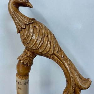 Hand carved wooden walking stick by dogwood tree with phoenix | Etsy