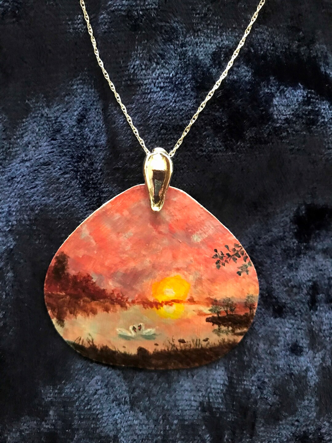 Two Swans Float on a Lake in This Serene Picturesque Sunset Painting ...