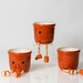 Winking Face Pot ~ Orange Sitter Pot With Dangling Legs ~ A Super Cute ...