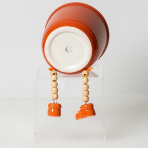 Winking Face Pot ~ Orange Sitter Pot With Dangling Legs ~ A Super Cute ...