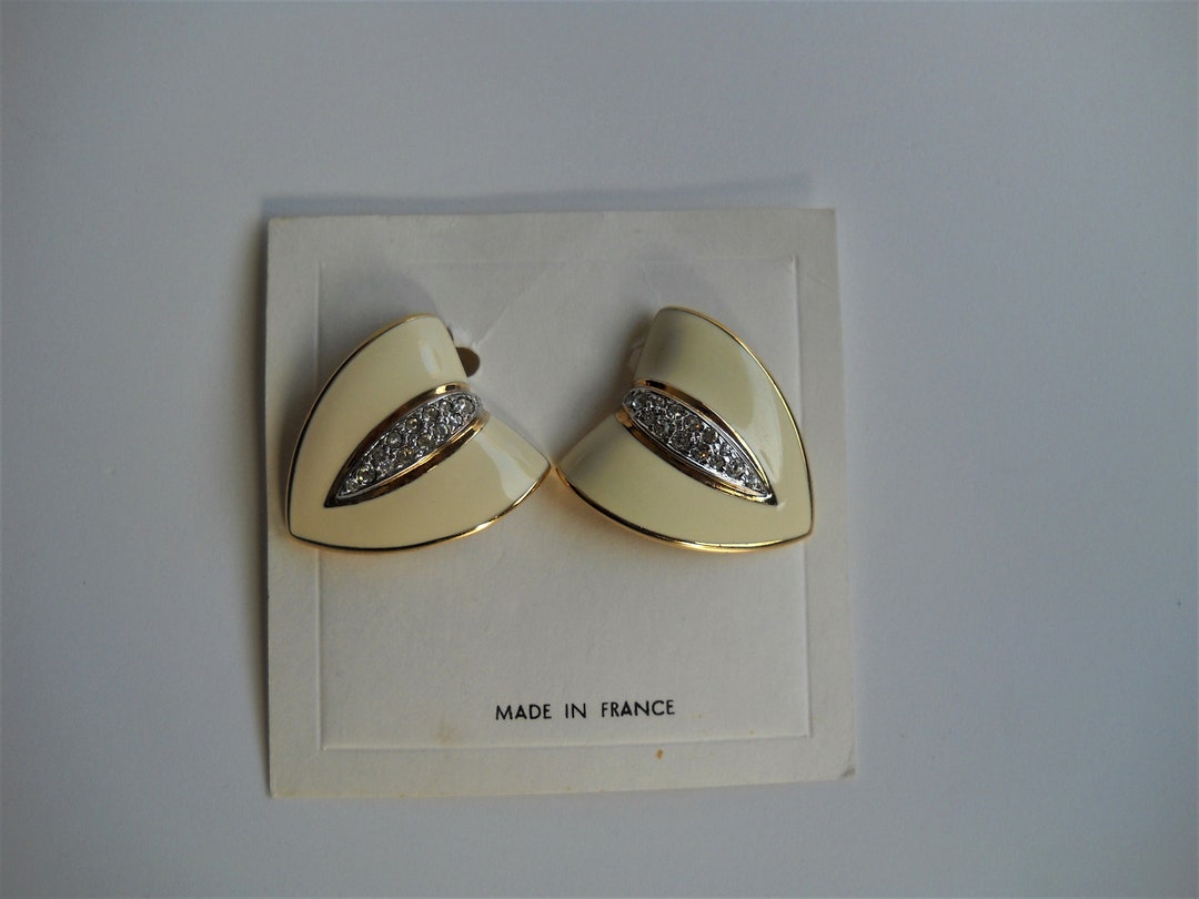 70's Austrian Clip on earrings. Leaf-shaped in ivory enamel. Golden ...