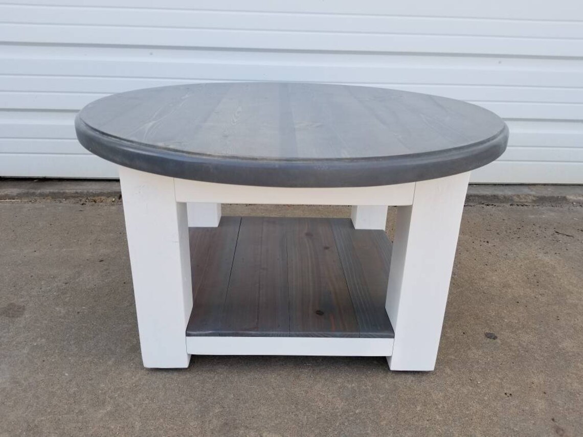Round Farmhouse Coffee Table With Gray Stained Top and Lower Shelf ...