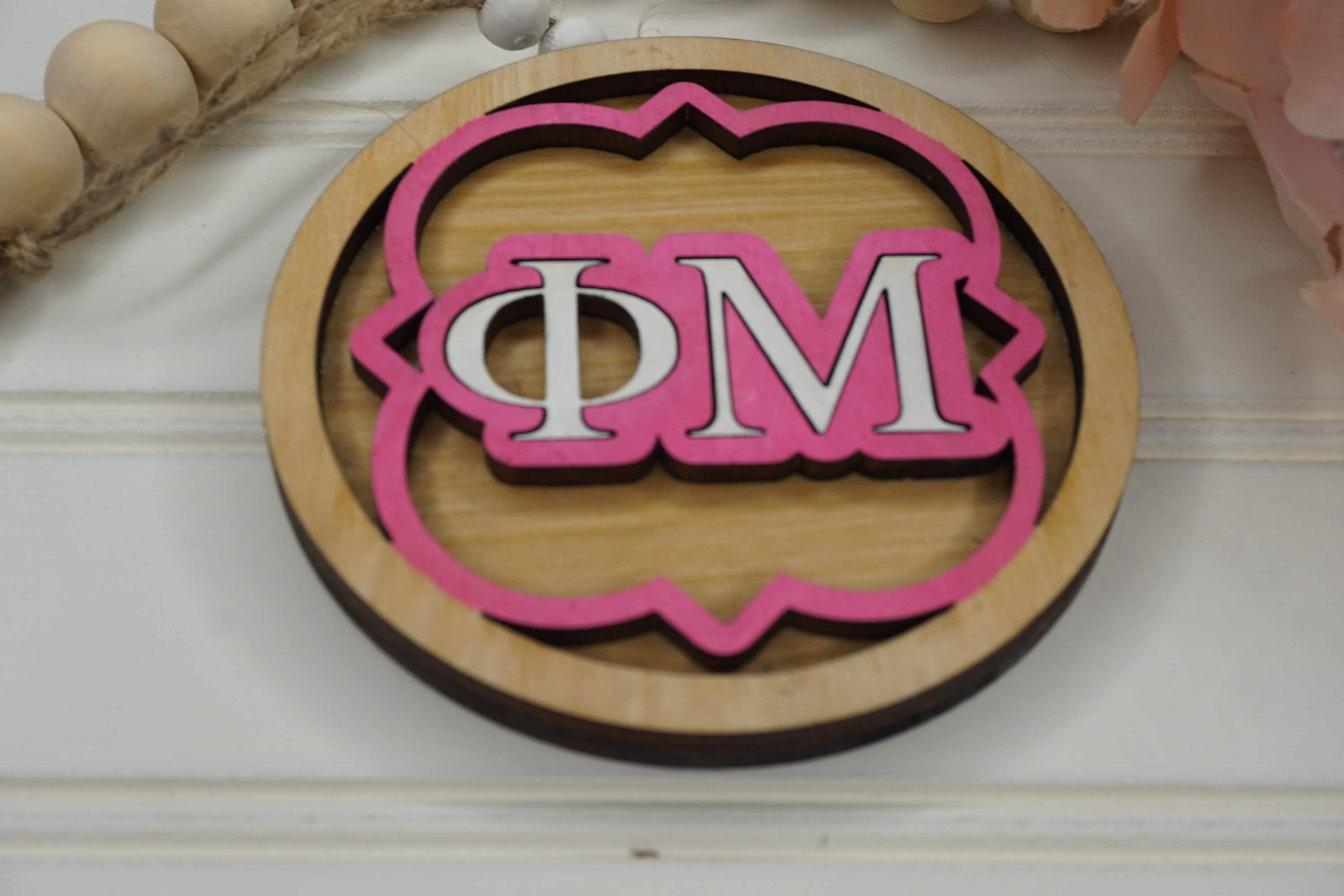 Phi Mu Quatrefoil Symbol