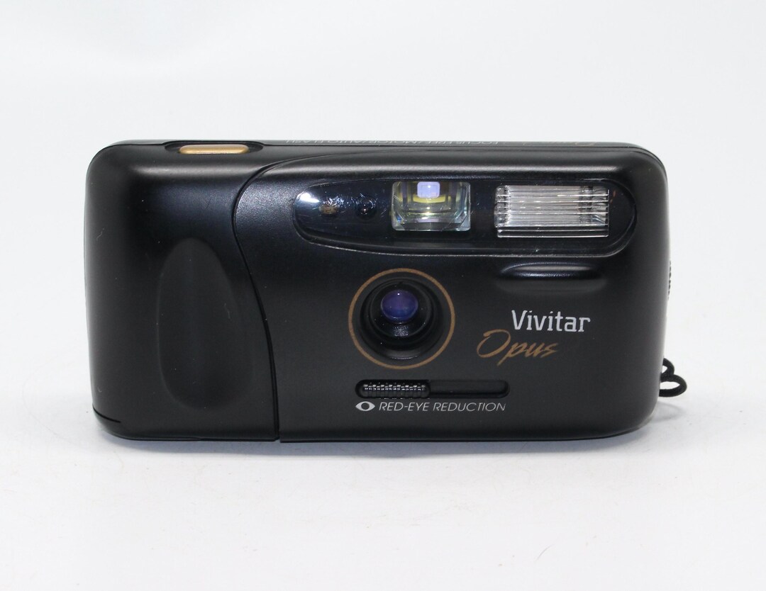 Vivitar Opus 20 Palm Size Mini Sub Mini 110 Film Camera With New Lomography Film and Carry Case ...