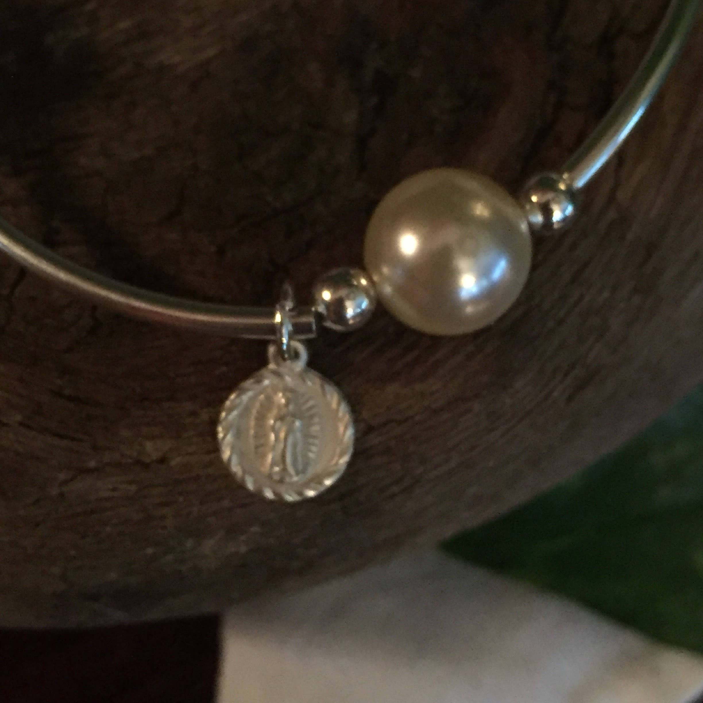 The Sacred Pearl--Sterling