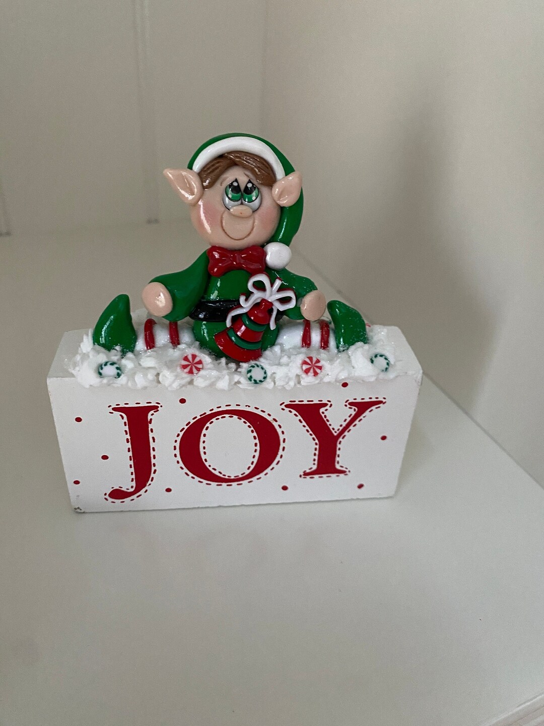 Polymer Clay Elf Sitting on a Wooden Joy Sign - Etsy