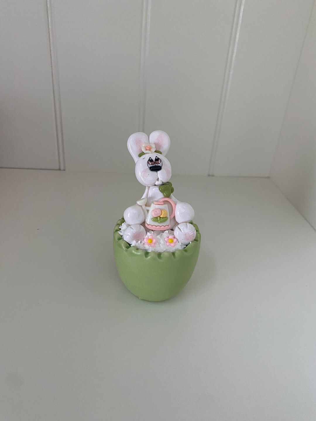 Polymer Clay Easter Bunny Sitting in a Ceramic Egg With a Watering Can ...