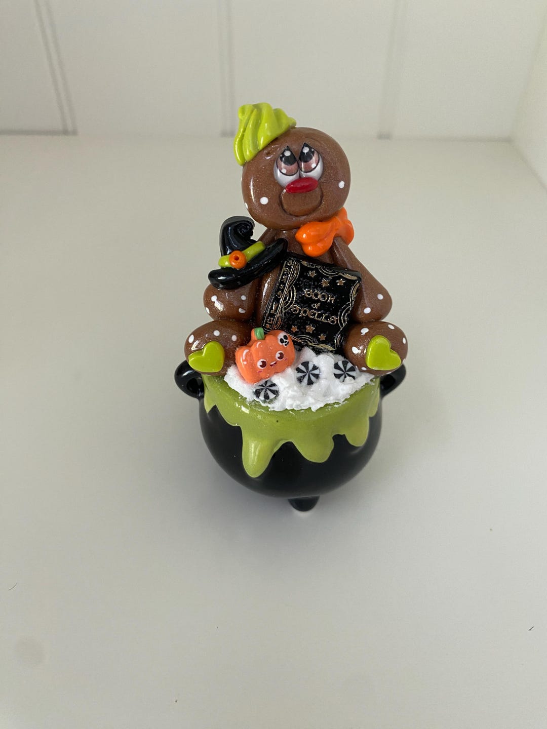 Polymer Clay Gingerbread Man Sitting on a Ceramic Cauldron - Etsy