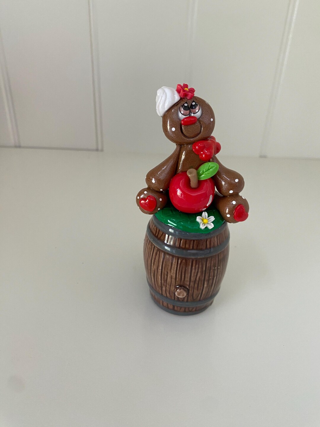 Polymer Clay Gingerbread Man Sitting on a Ceramic Whiskey Barrel With ...