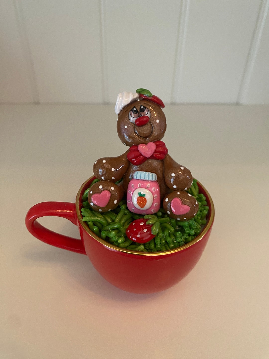 Polymer Clay Gingerbread Man Sitting in a Red Ceramic Cup With ...