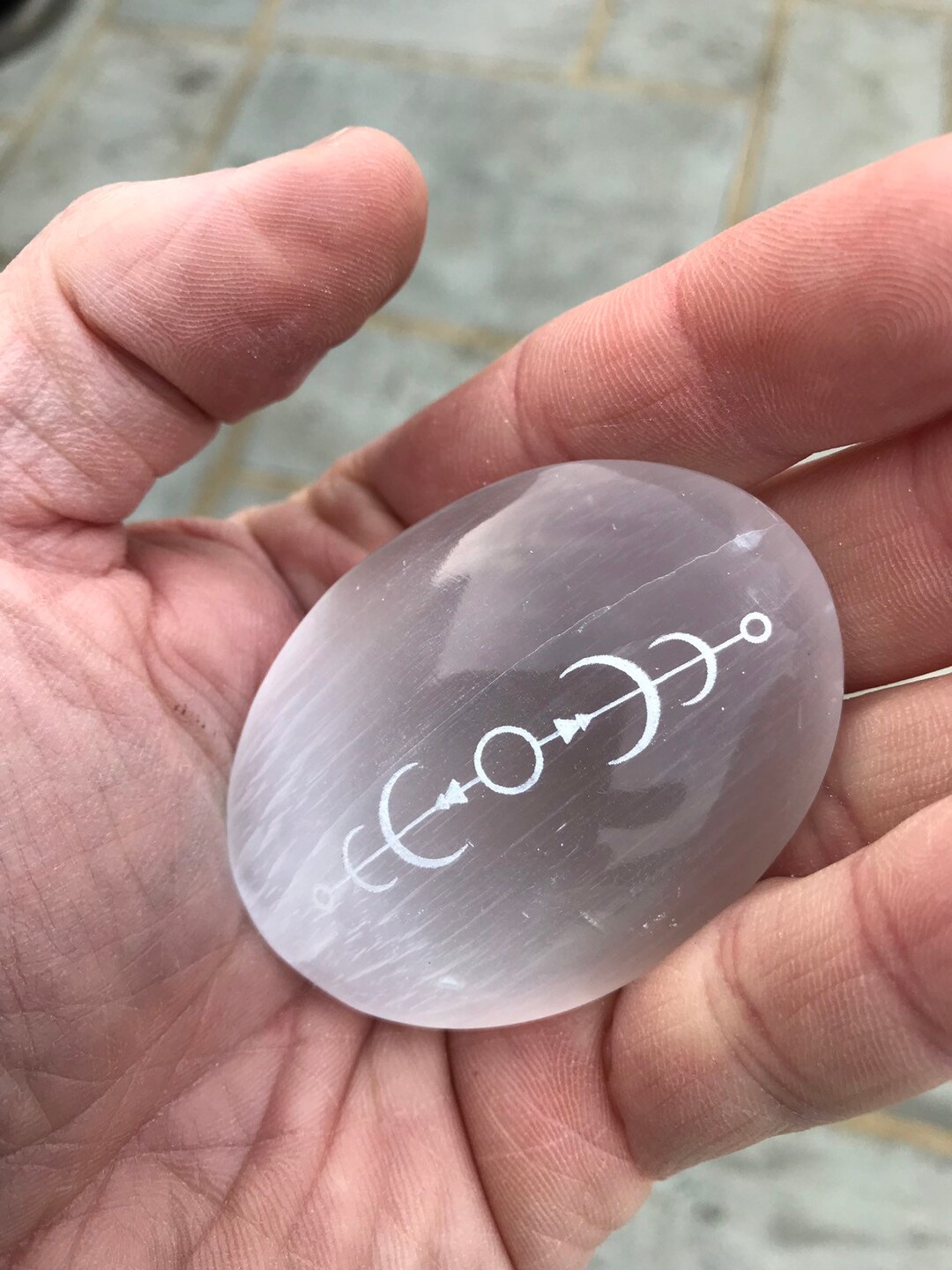 Pure Selenite Crystal Has Palm Stone Engraved With the Moon Phases ...