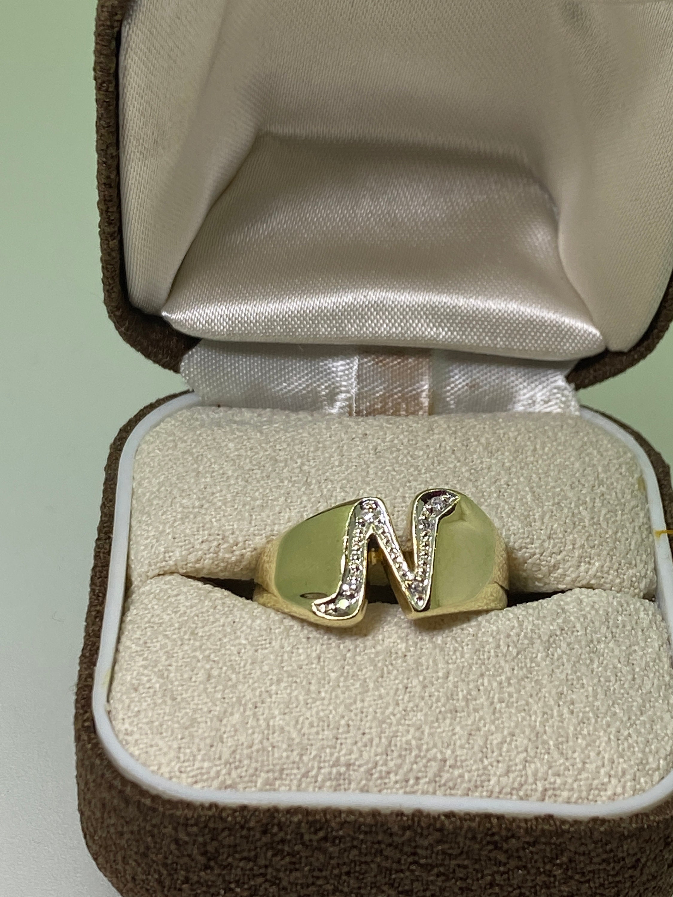 N Letter In Gold Rings