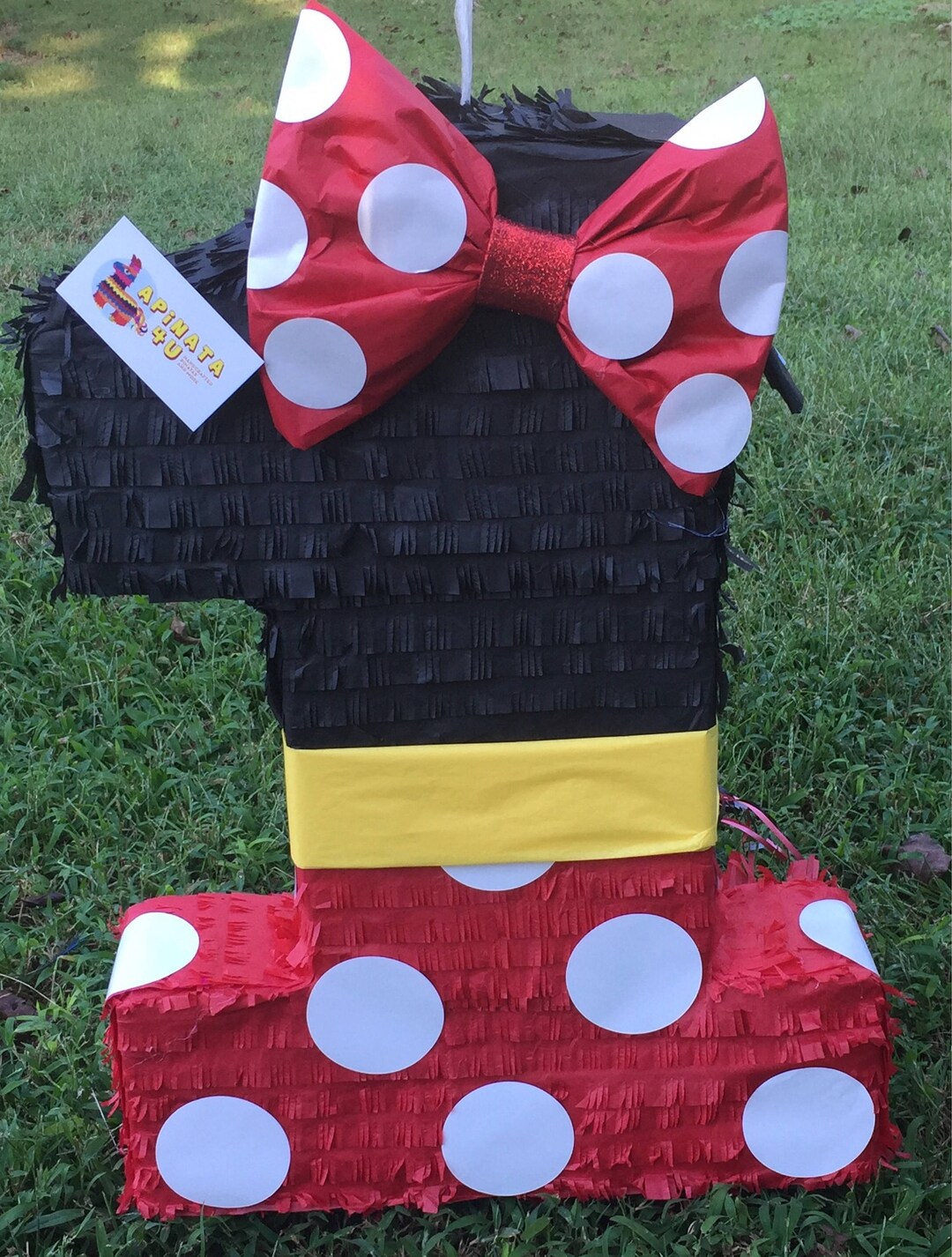 Piñata número uno roja, negra y amarilla de 20 pulg. de alto con lazo ...