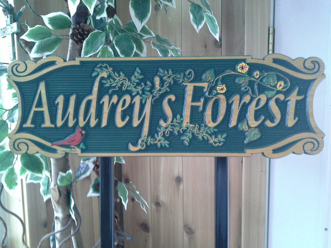 The Garden Sign - Highlighted by Vines, Flowers and a Red Bird ...