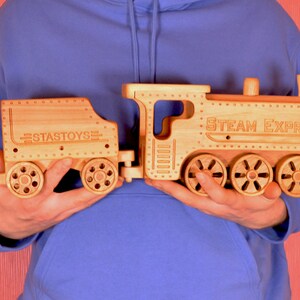 Wooden Toy Train Set / A Locomotive With a Tender and a Freight Car ...