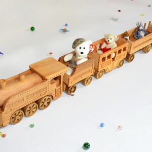 Wooden Toy Train Set / A Locomotive With a Tender and a Freight Car ...