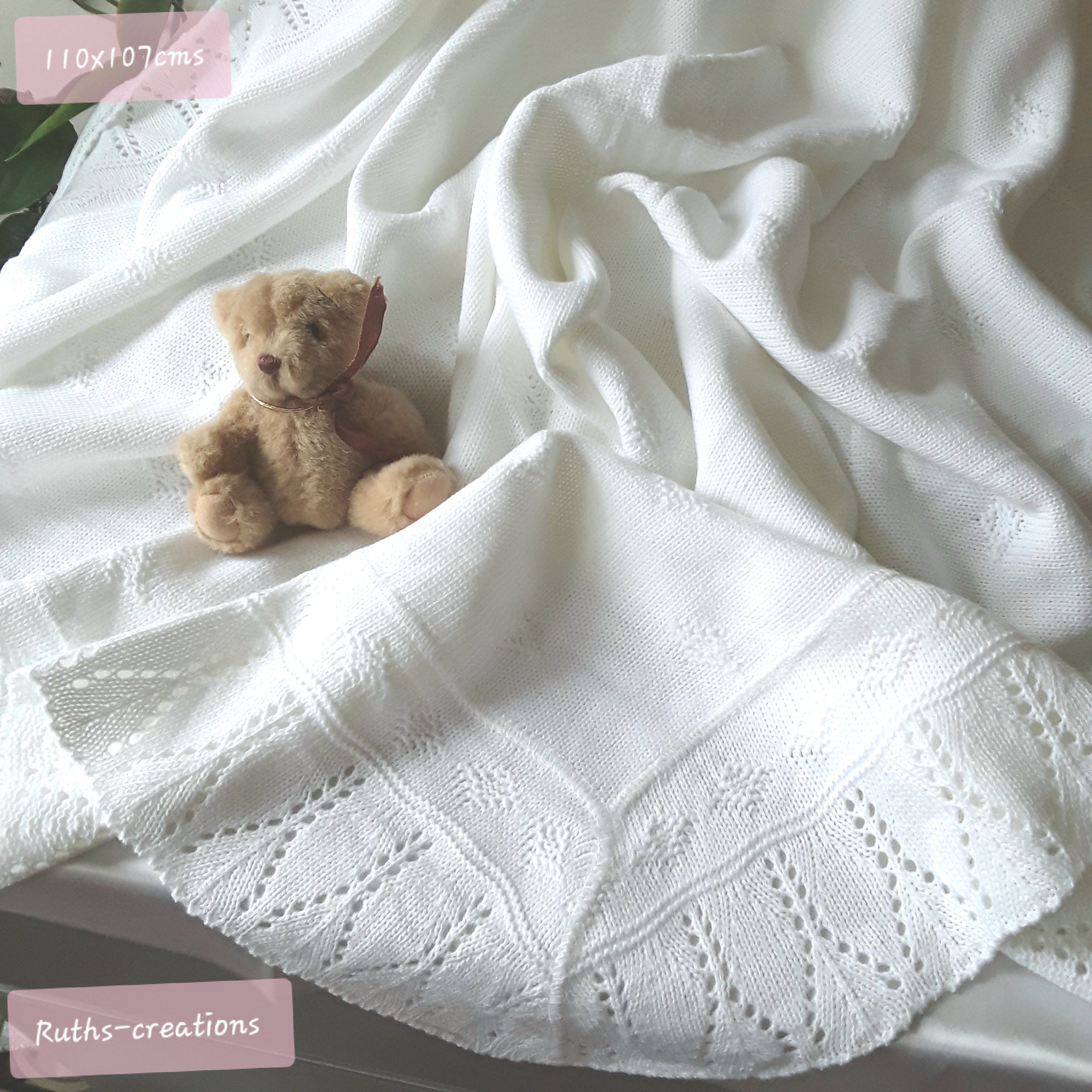 A Beautiful White Baby Shawl made with Acrylic.