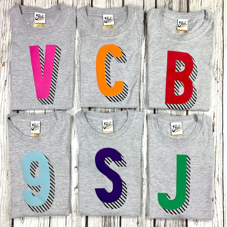 Kids bright letter T-Shirt. Personalise clothing with your | Etsy