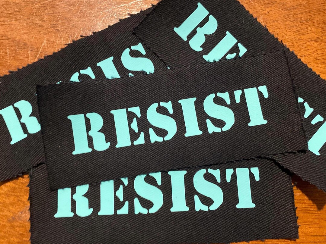 RESIST - Black Sew on Patch With Teal Text - Etsy