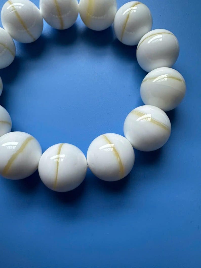 Tridacna Shell Beads: 16mm White Round Beads With Gold Stripe - STOCK ...