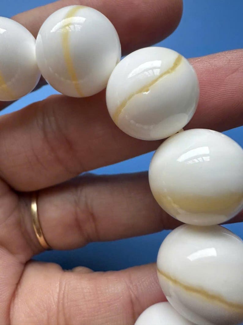 Tridacna Shell Beads: 16mm White Round Beads With Gold Stripe - STOCK ...