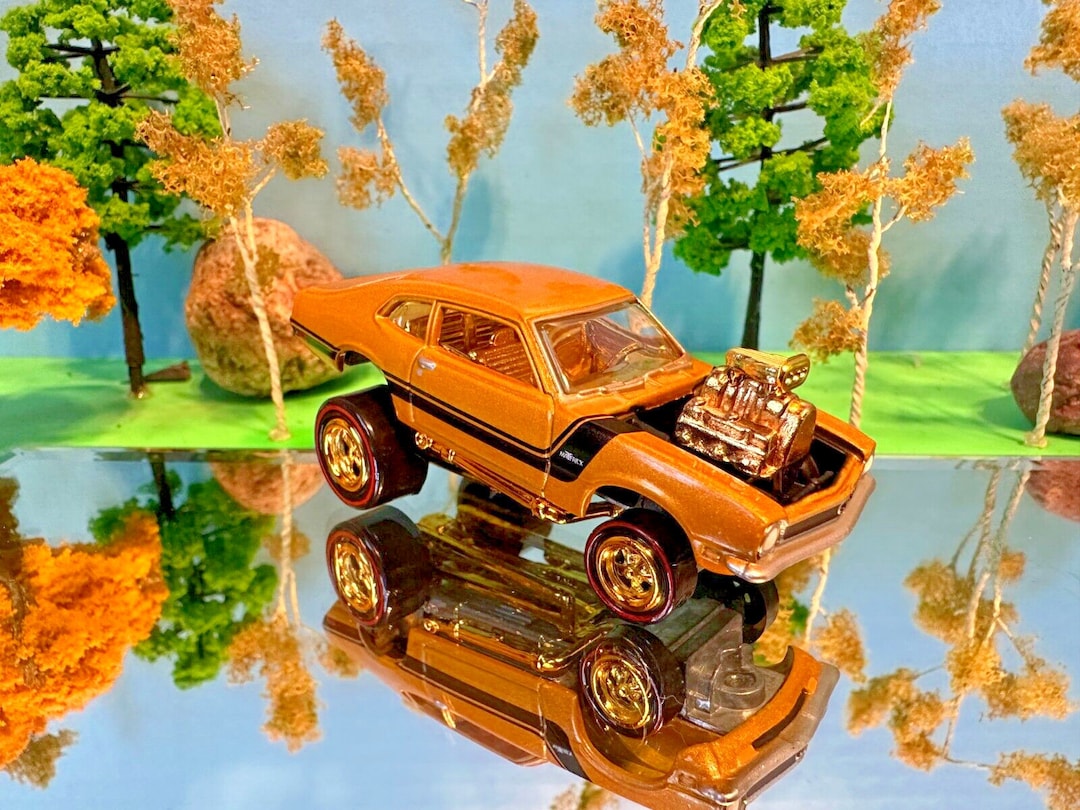 1972 Ford Maverick Gold Flame Metallic Zingers Johnny Lighting Street ...