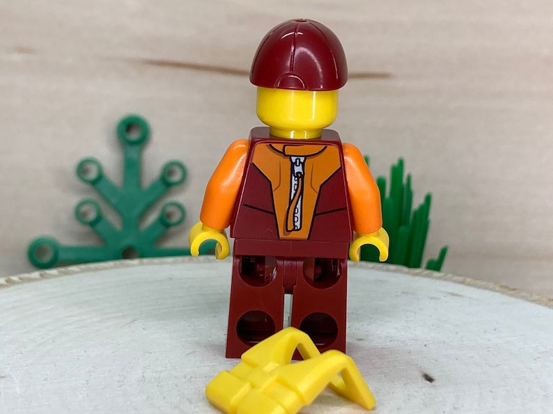Lifeguard Wearing a Dark Red Cap and a Life Jacket – City: Coast Guard ...